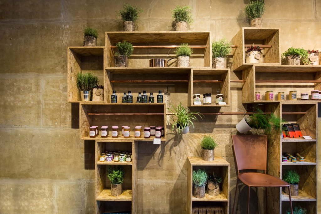 10 Wall Storage Ideas to Maximize Small Stores on a Budget | Storefront